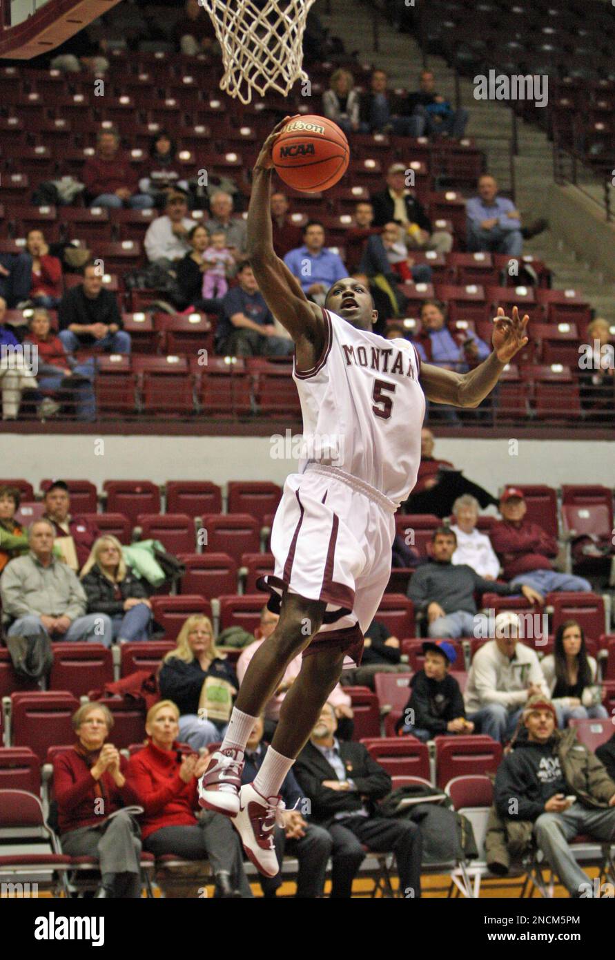 Montana Guard Will Cherry goes in on a breakaway layup against Idaho in ...