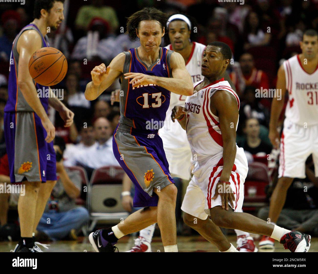 Phoenix Suns' Steve Nash has the ball knocked away by Houston Rockets ...