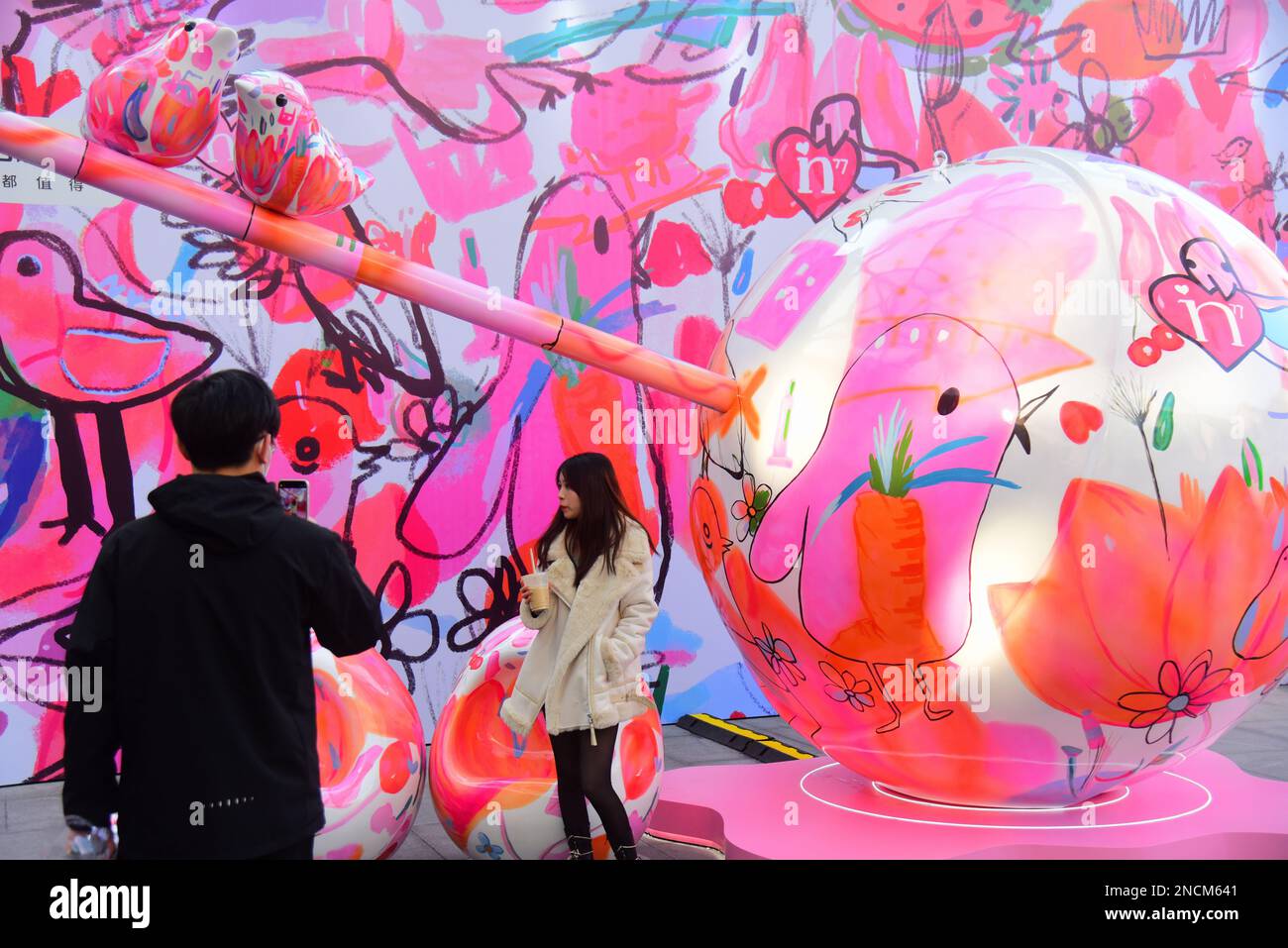 A giant lollipop-shaped decoration appears by the West Lake, attracting ...