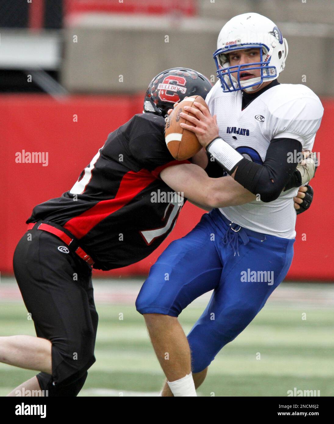 West Point Central Catholic's quarterback Anthony Ridder, right, is ...