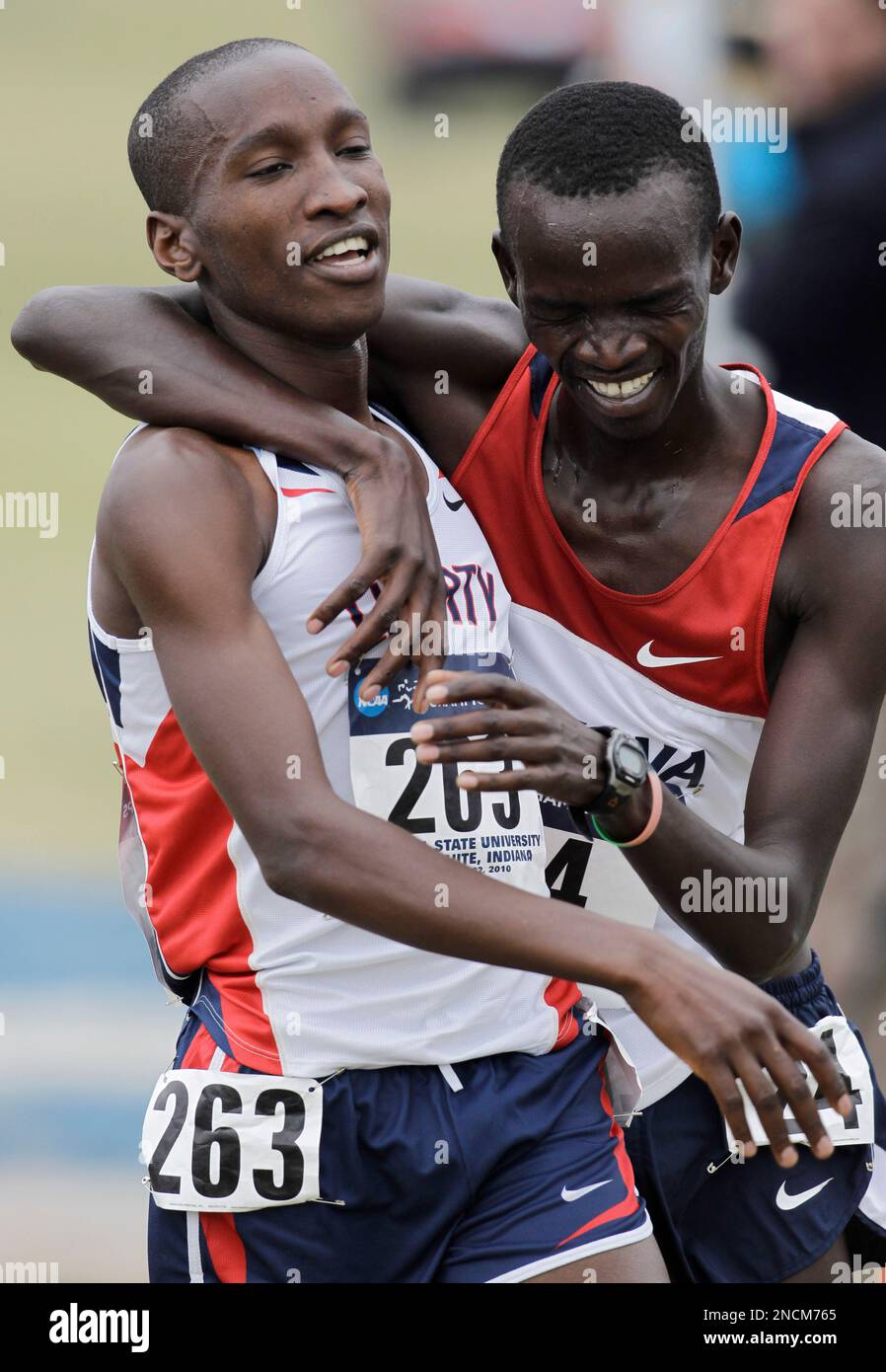 Liberty's Samuel Chelanga, left, and Arizona's Stephe Sambu react ...
