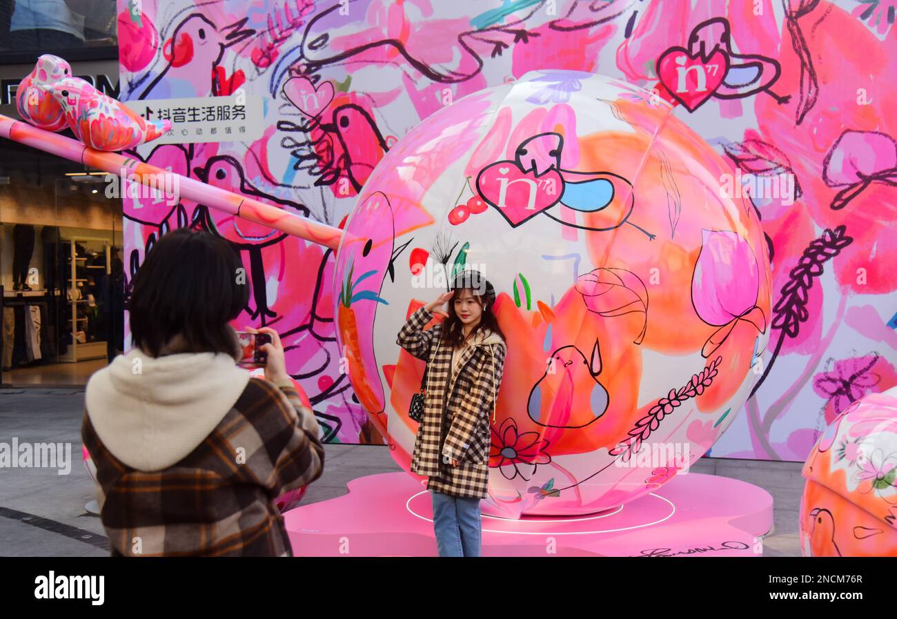 A giant lollipop-shaped decoration appears by the West Lake, attracting ...