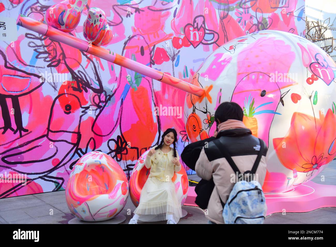 A giant lollipop-shaped decoration appears by the West Lake, attracting ...