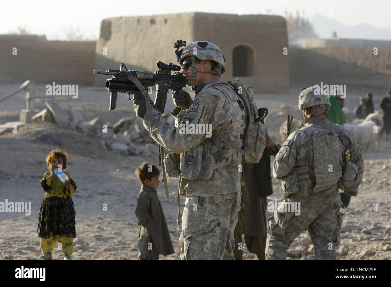 US Army Spc. Milton Mallernee, foreground, from First Battalion, 502nd ...