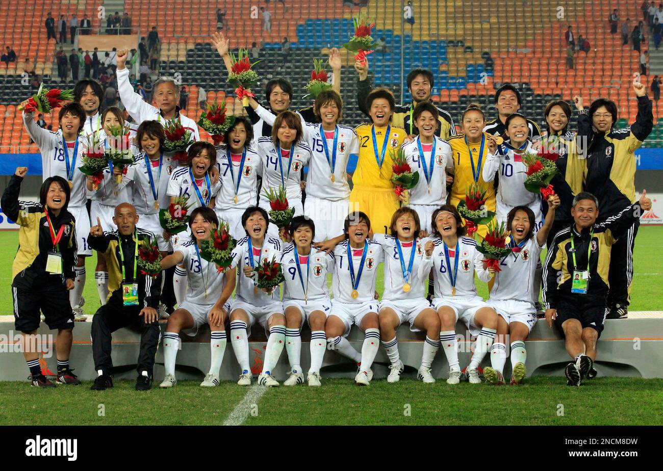 Japan's players celebrate after winning the gold medal tat the women's ...