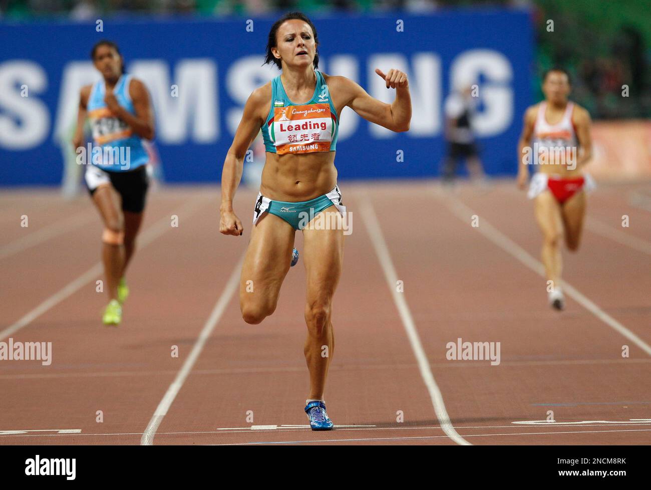Uzbekistan's Yuliya Tarasova wins the women's Heptathlon 100m Hurdles ...