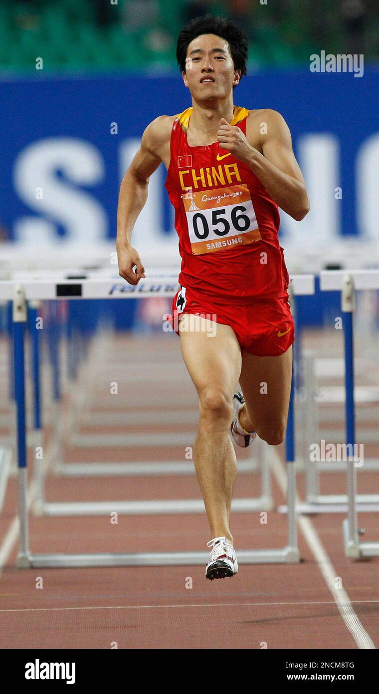 China's Liu Xiang competes in a men's 110m Hurdles heat, at the 16th ...