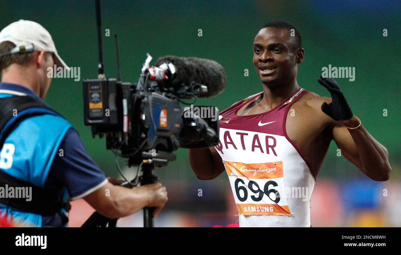 Qatar's Femi Seun Ogunode celebrates after winning the men's 400m final ...