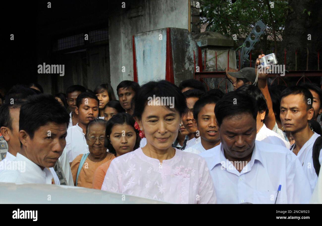 Myanmar's pro-democracy leader Aung San Suu Kyi leaves her National ...