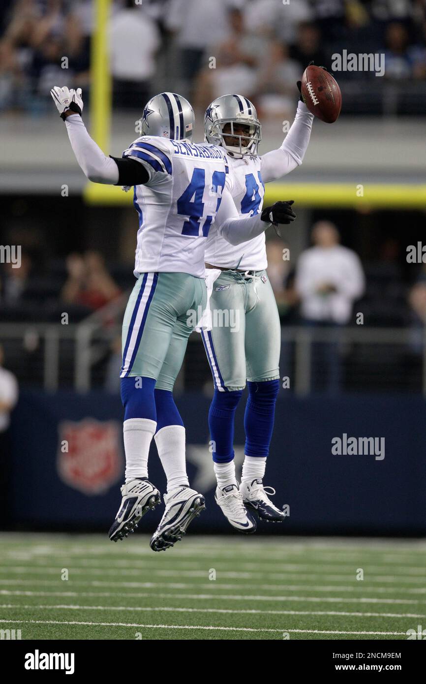 Dallas Cowboys safety Gerald Sensabaugh (43) and cornerback Terence ...