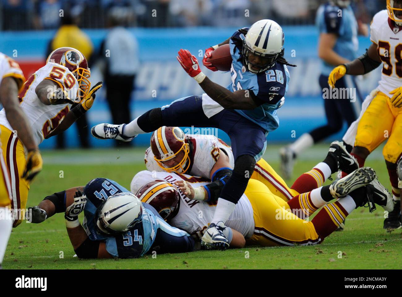 Tennessee Titans running back Chris Johnson (28) runs against the ...