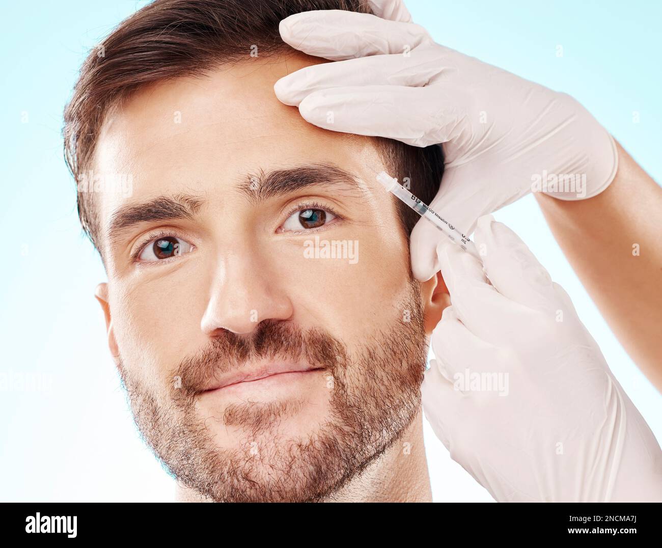 Portrait, man and needle for cosmetics, dermatology and beauty on blue ...