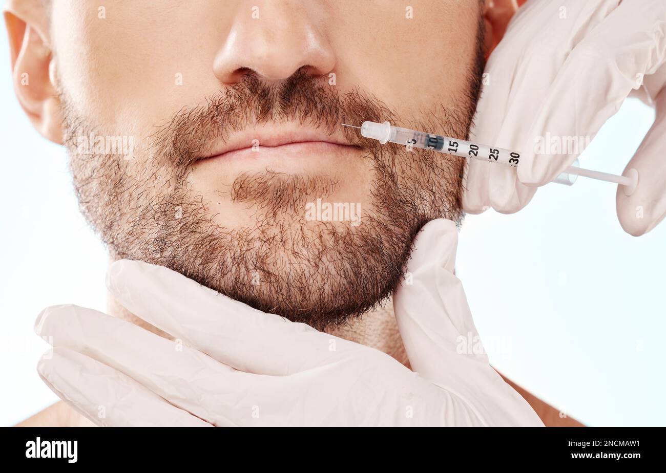 Man, lip filler injection and mesotherapy with face, hands and needle ...
