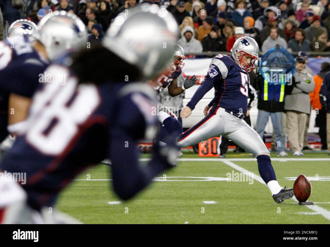 New England Patriots place kicker Shayne Graham (5) kicks off in the ...