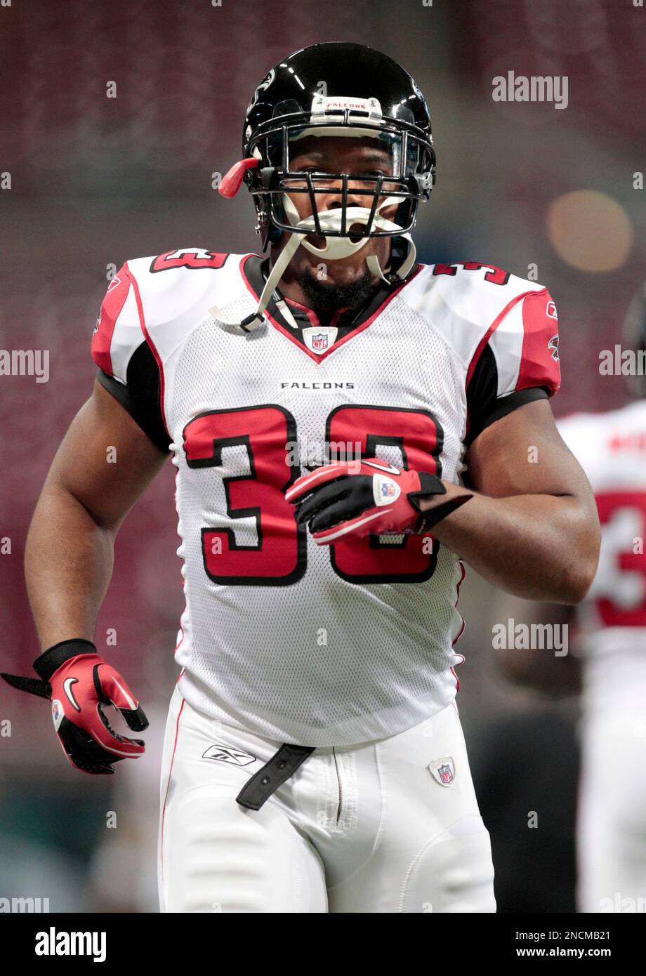 Atlanta Falcons running back Michael Turner (33) warms up before the start of an NFL football ...