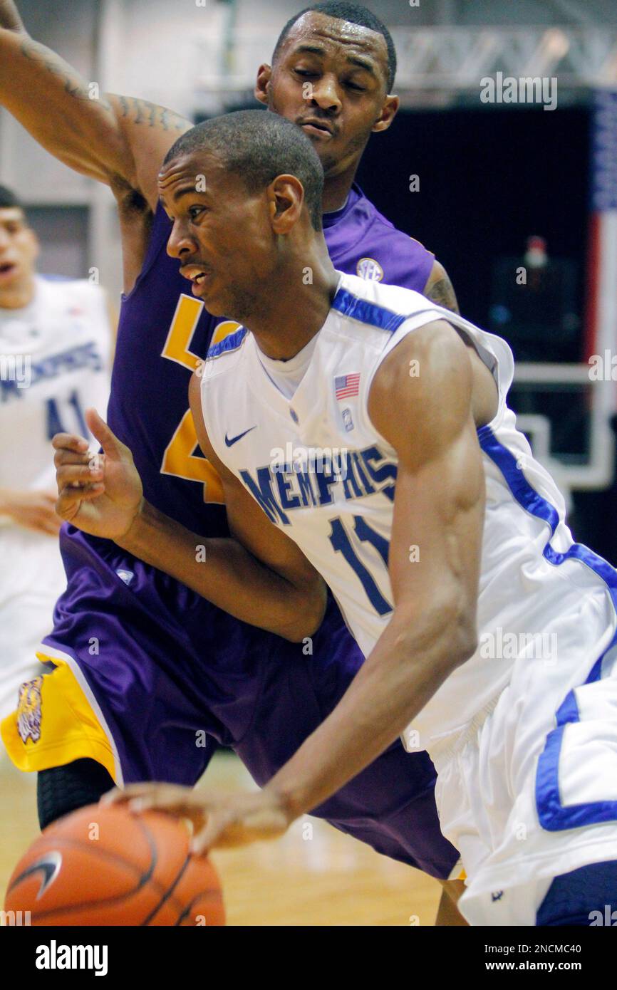 Memphis forward Wesley Witherspoon (11) dribbles against LSU guard ...