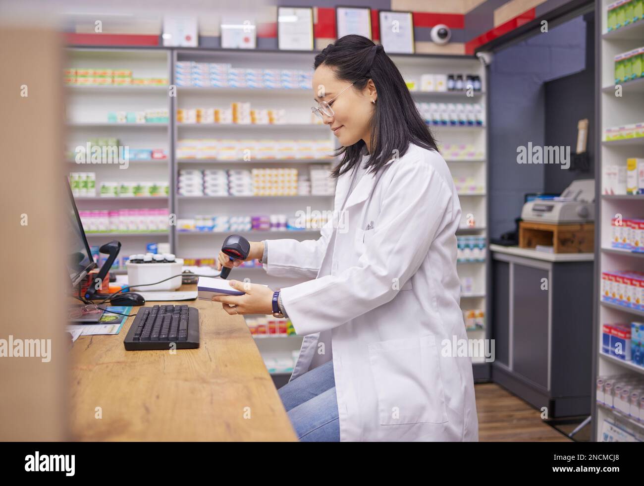 Pharmacy, help and asian woman at checkout counter for prescription ...