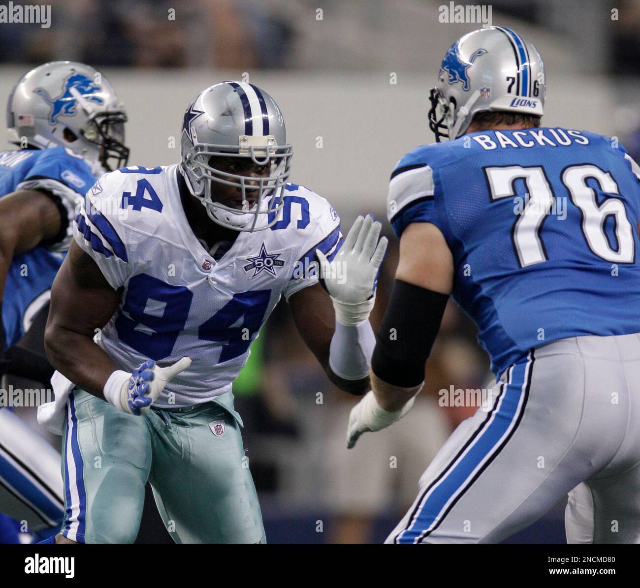 Dallas Cowboys linebacker DeMarcus Ware (94) and Detroit Lions tackle ...