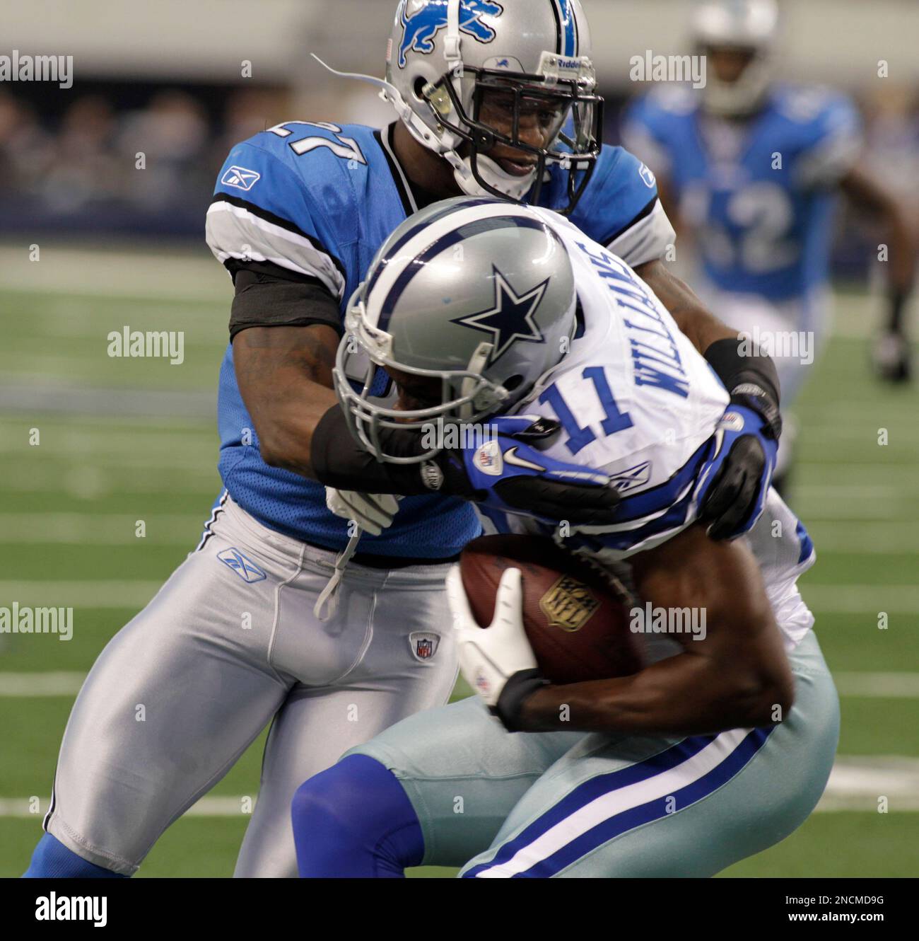 Detroit Lions cornerback Alphonso Smith (27) and Dallas Cowboys wide ...