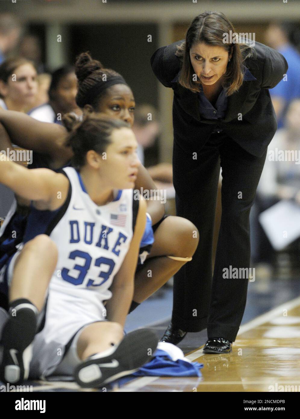 Duke's head coach Joanne McCallie whispers to Haley Peters (33) and ...