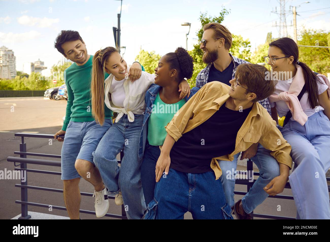 Cheerful multiethnic young man and woman friends different races and ...