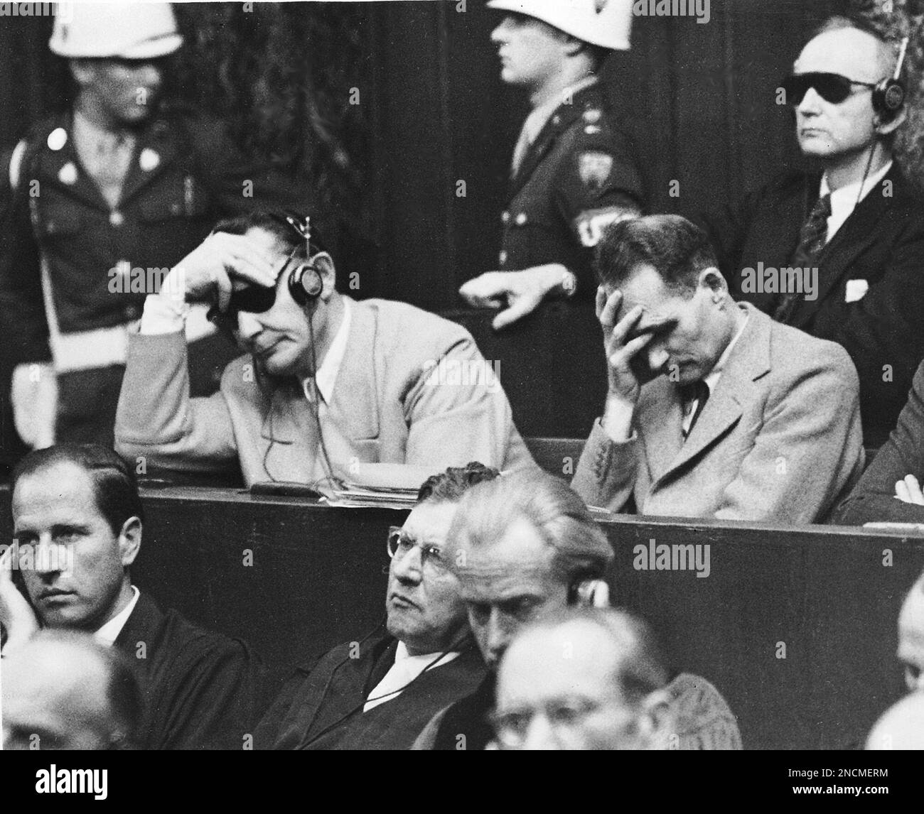 FILE - In this Sept. 30 1946 b/w file picture Rudolf Hess, right, holds ...