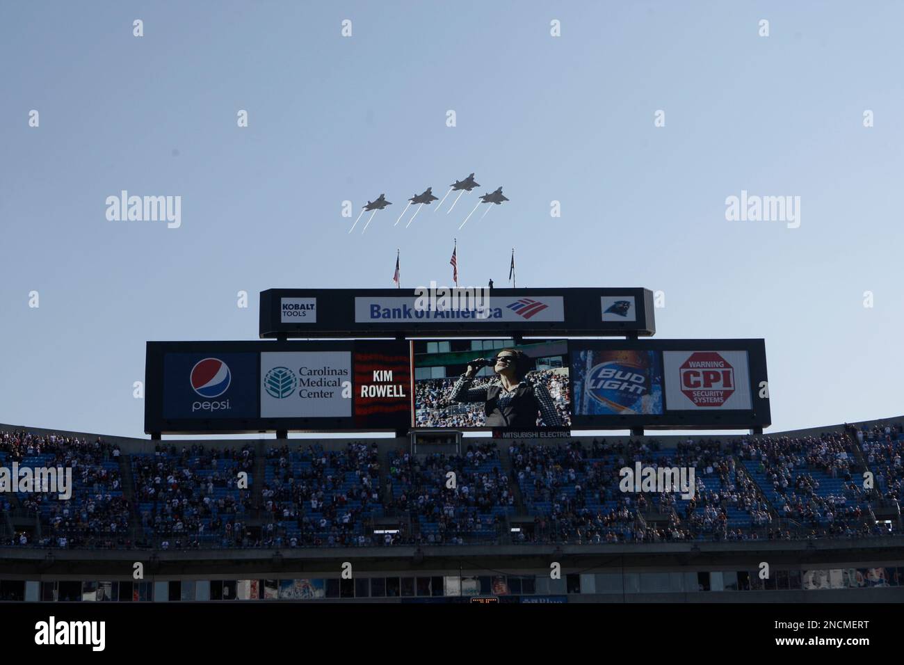 Jets fly over Bank of America Stadium before an NFL football game ...
