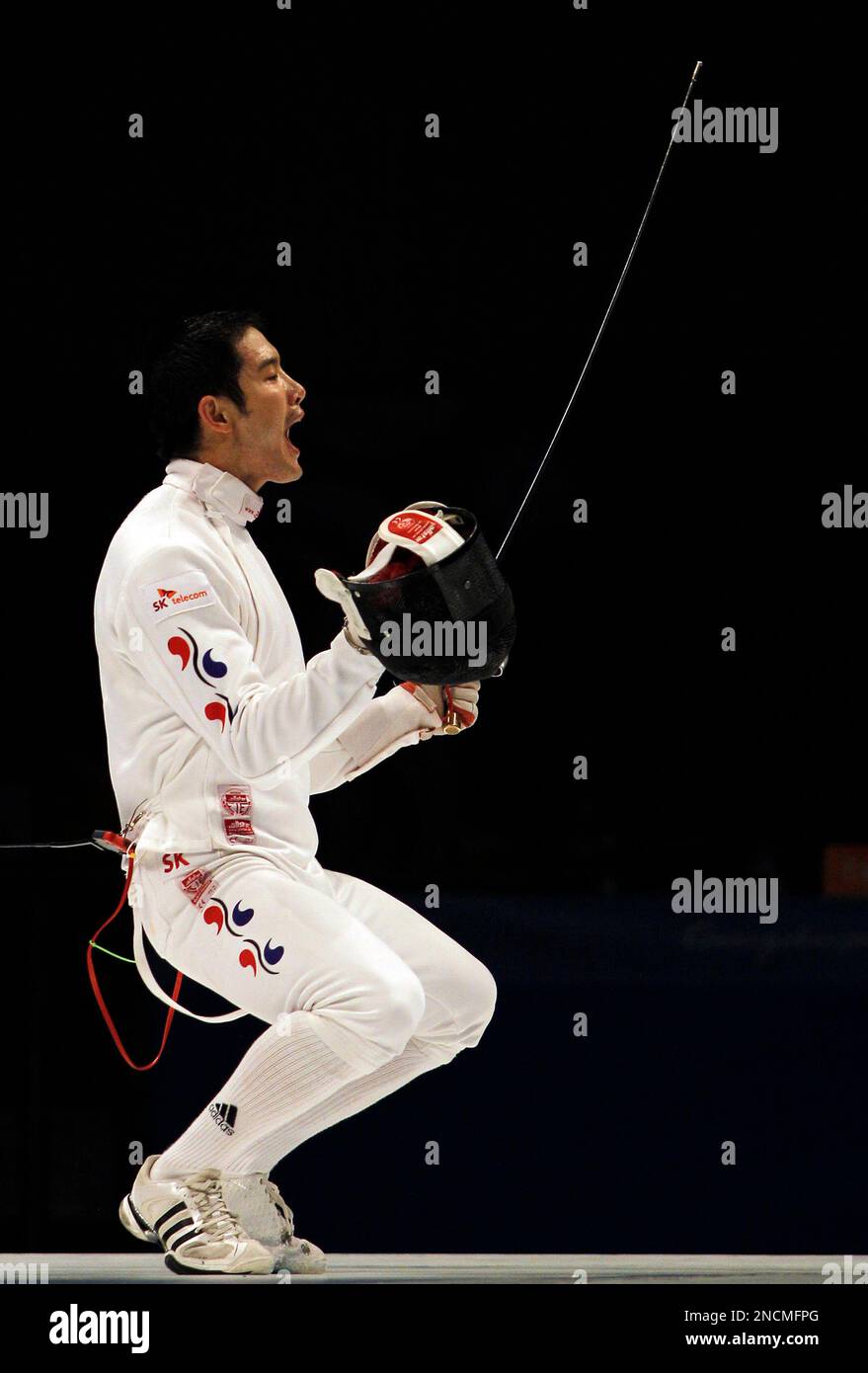 Won Jin Kim of South Korea celebrates a point in the finals of the men ...