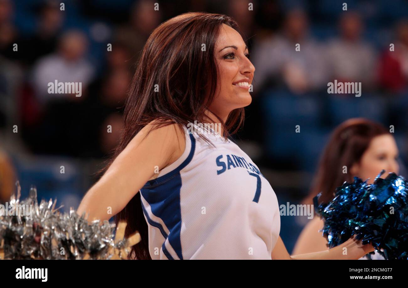 A Saint Louis University cheerleader performs during the first half of ...