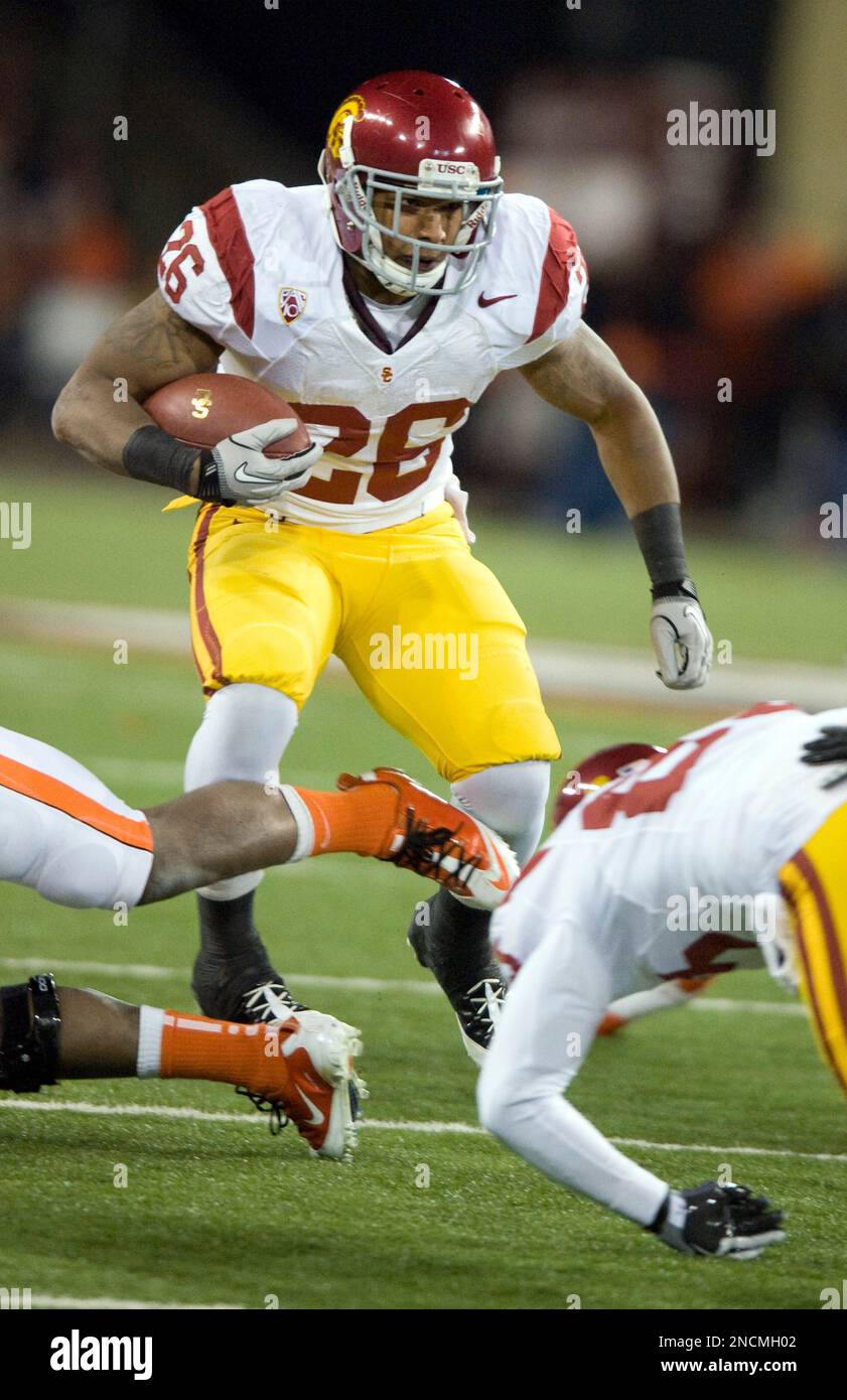 USC Trojans running back Marc Tyler (26) looks for some running room in ...