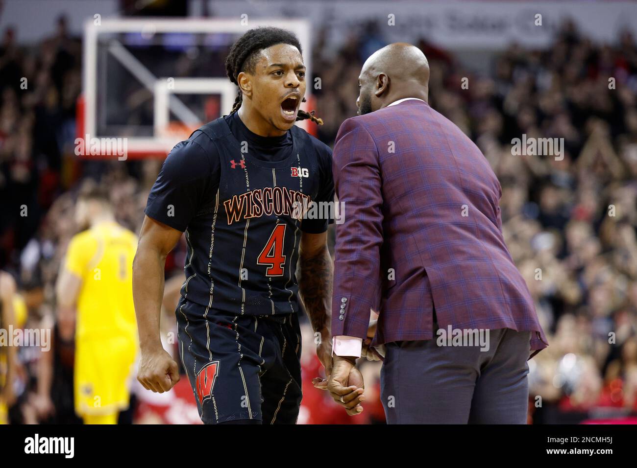 February 14, 2023: Wisconsin Badgers guard Kamari McGee (4) celebrates ...