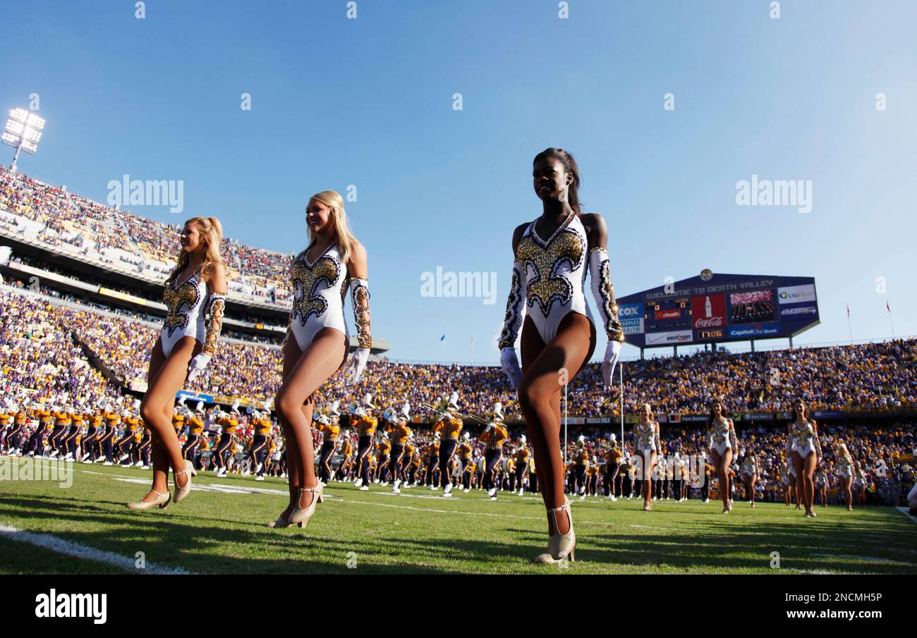 A member of the LSU Golden Girls dance team performs with the LSU ...