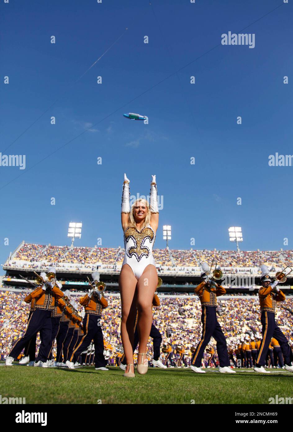 A member of the LSU Golden Girls dance team performs with the LSU ...
