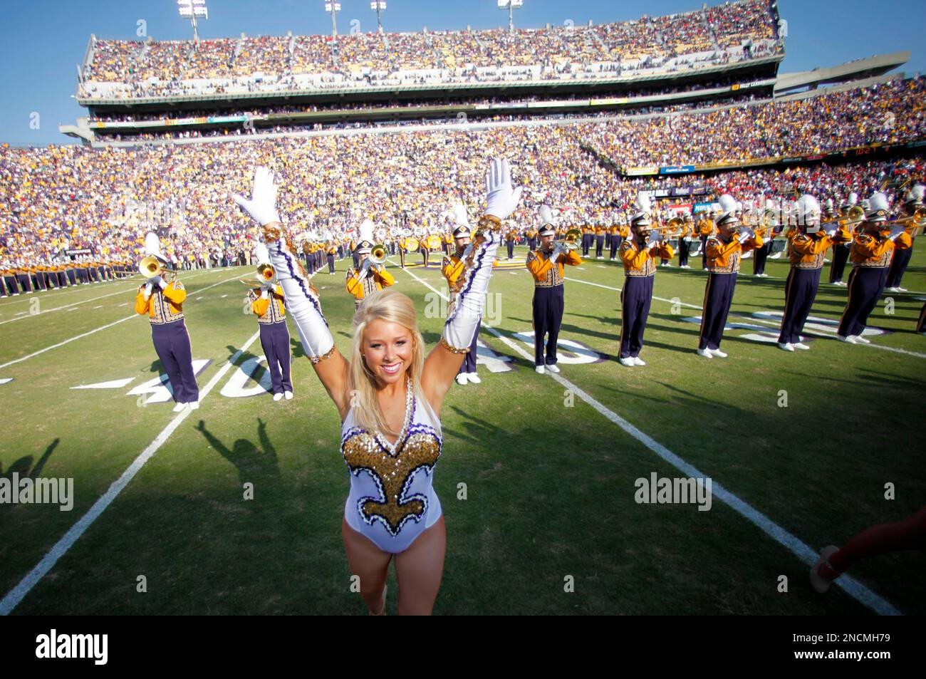 A member of the LSU Golden Girls dance team performs with the LSU ...