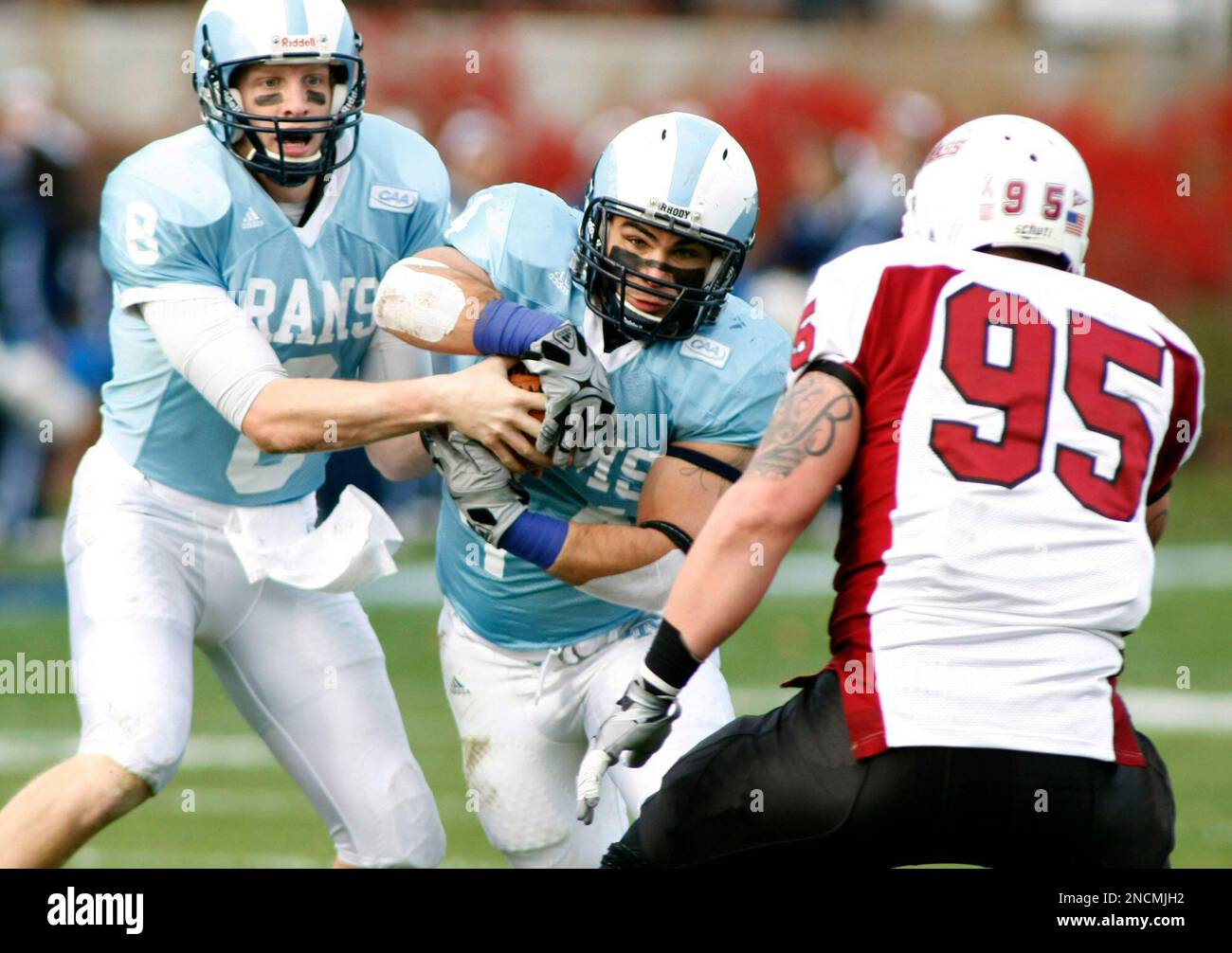 Rhode Island running back Anthony Ferrer takes a hand off from ...