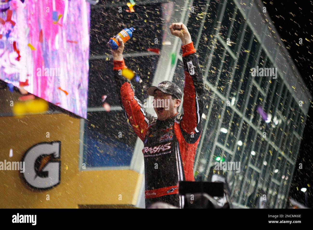 Kyle Busch celebrates after winning the the Ford 200 truck race in ...