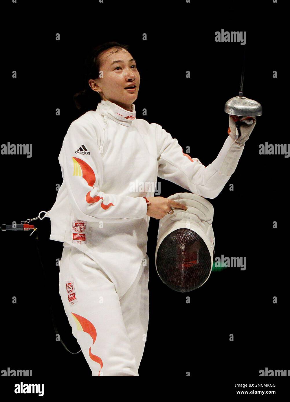 Chinese fencer Luo Xiaojuan reacts after defeating Japan's Nozomi ...