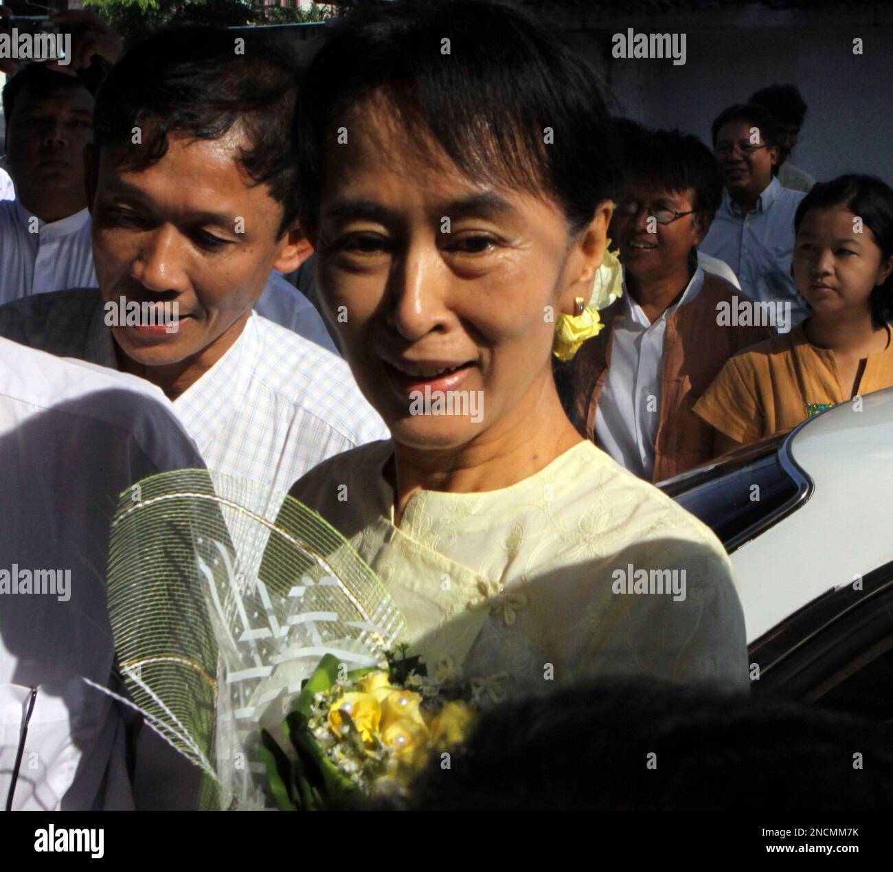 Myanmar's pro-democracy leader Aung San Suu Kyi arrives during they pay respects to doyen ...