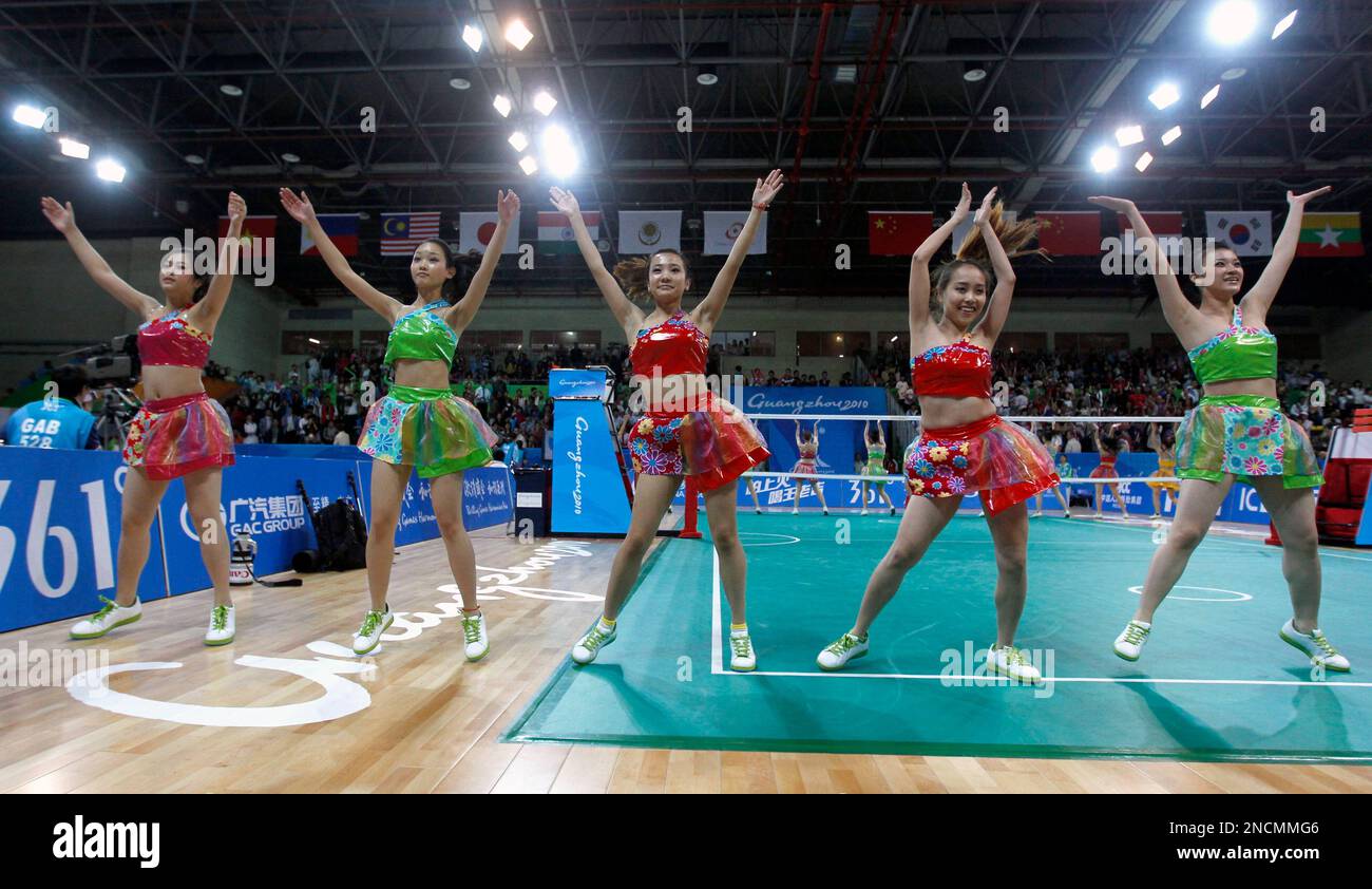 Cheerleaders perform before the medal presentation ceremony following ...