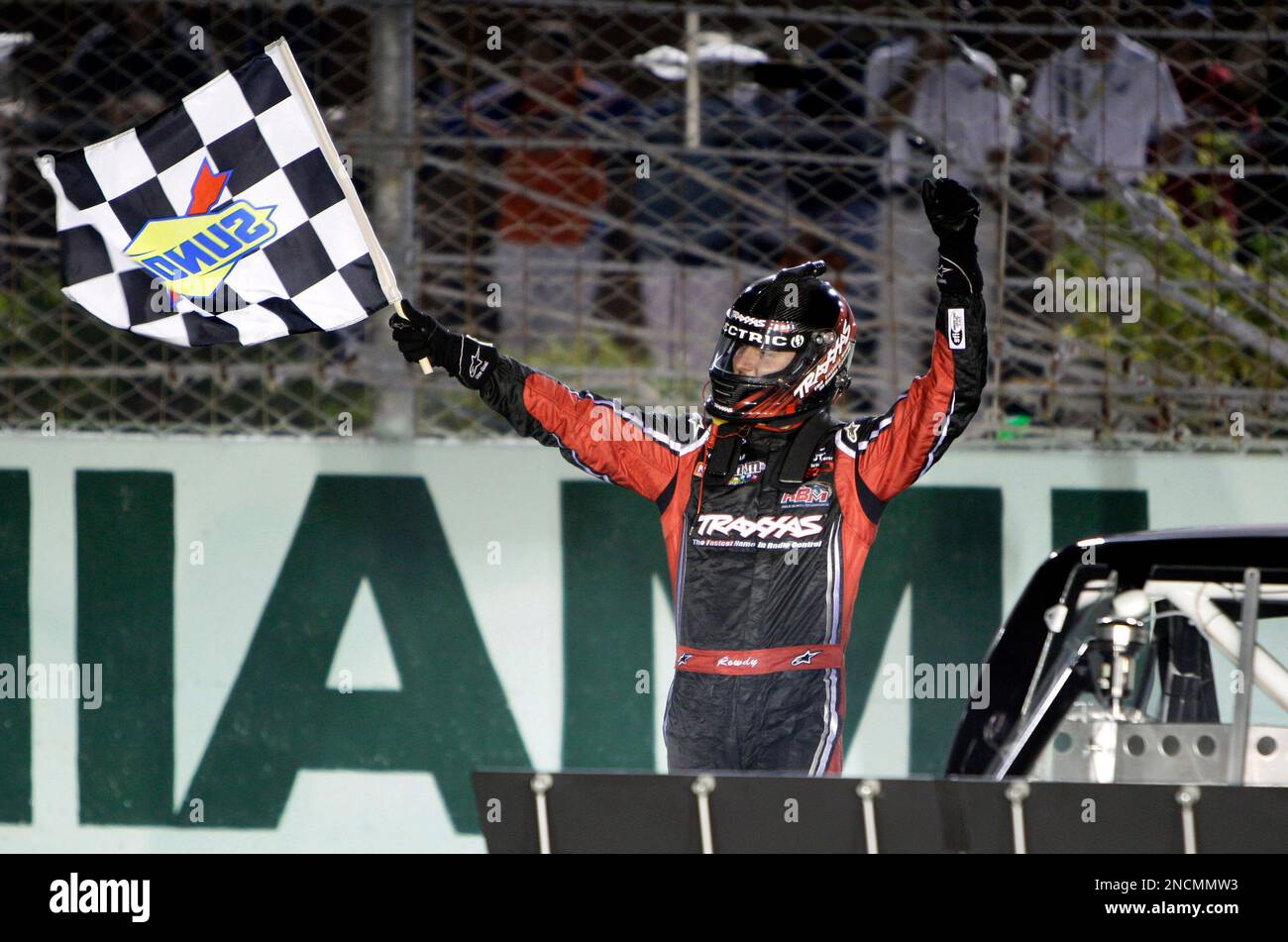 Kyle Busch celebrates after winning the the Ford 200 truck race in ...