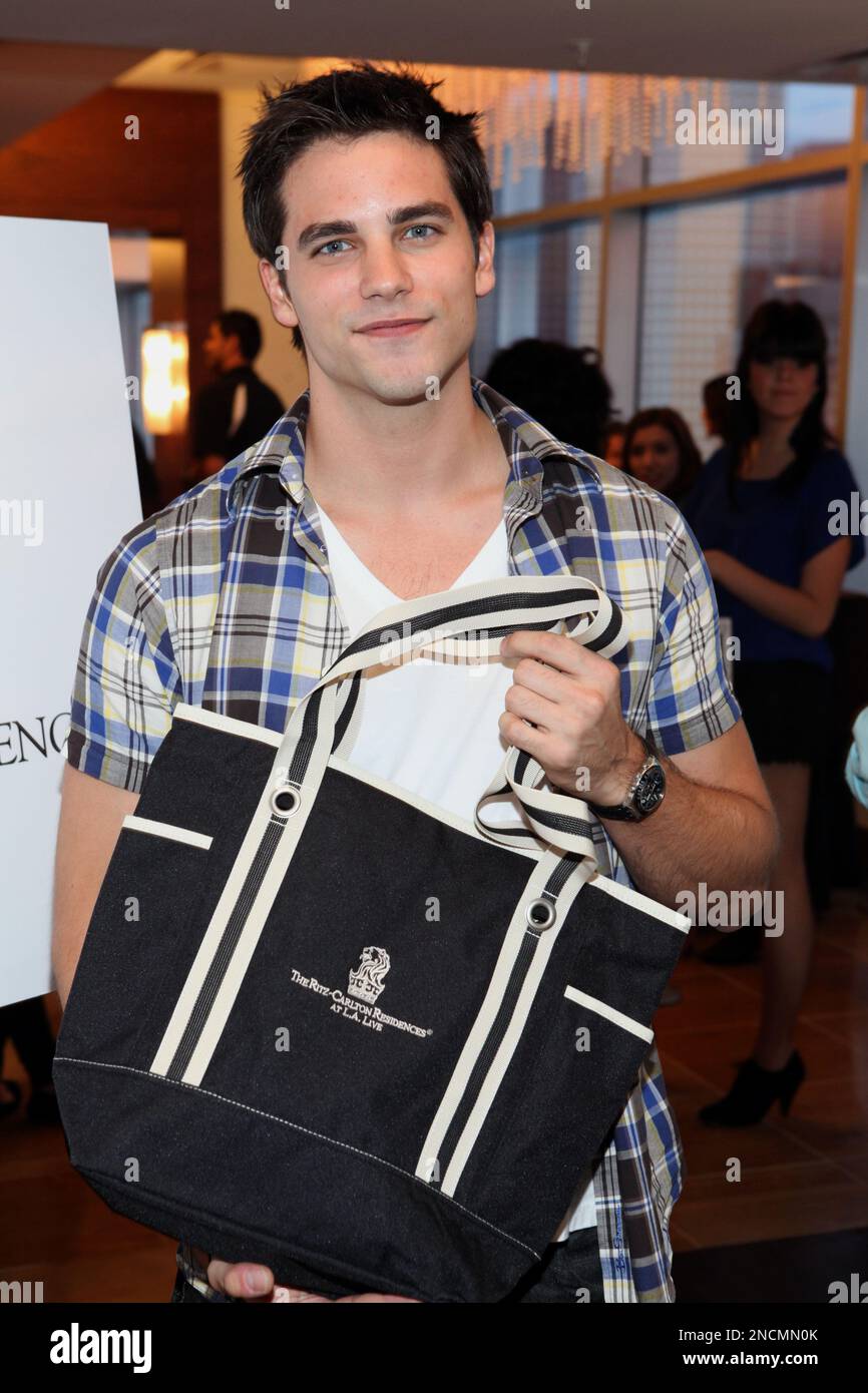 Brant Daugherty poses for a photo at an American Music Awards gifting ...