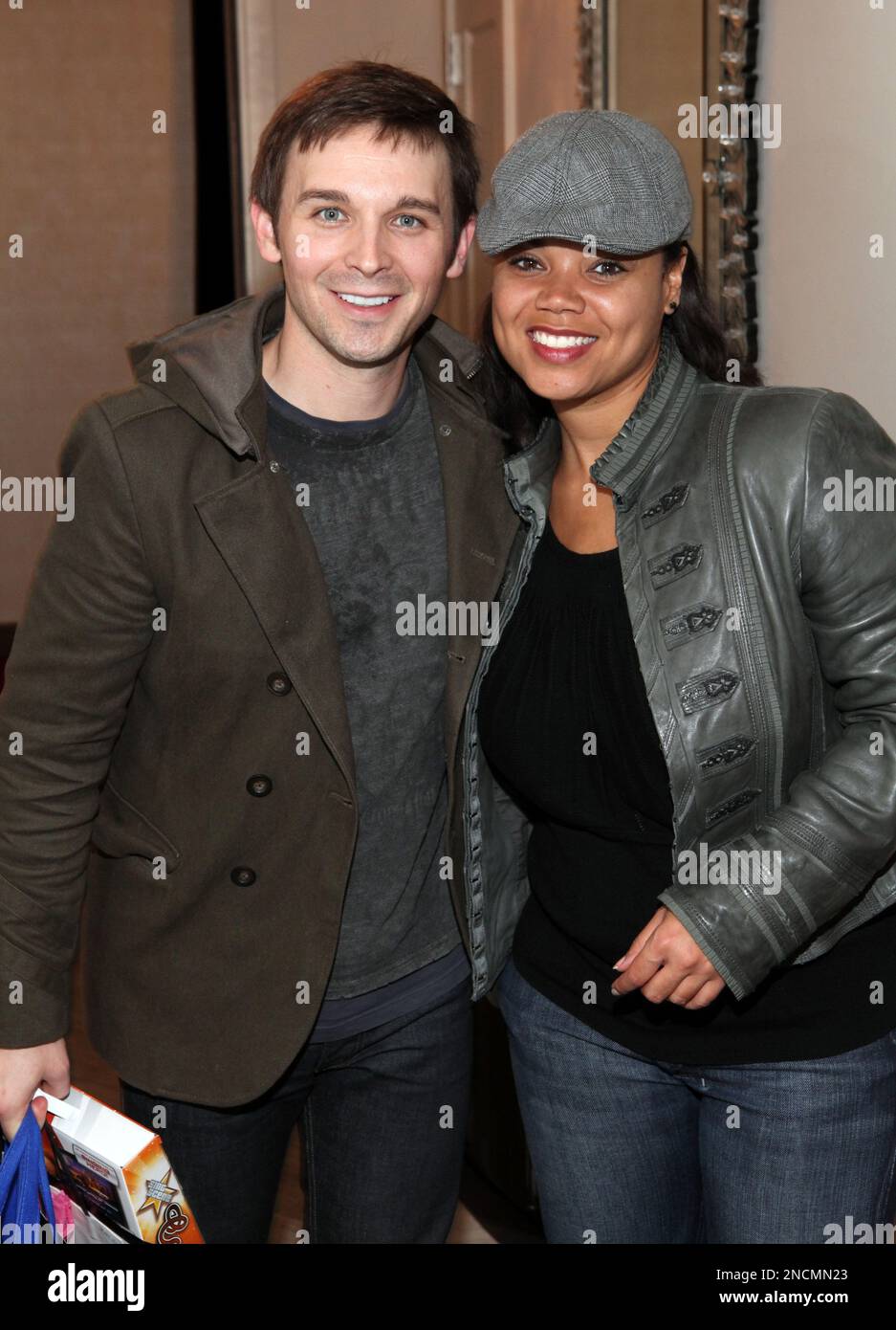 Kimberley Locke, right, and a guest pose for a photo at an American ...