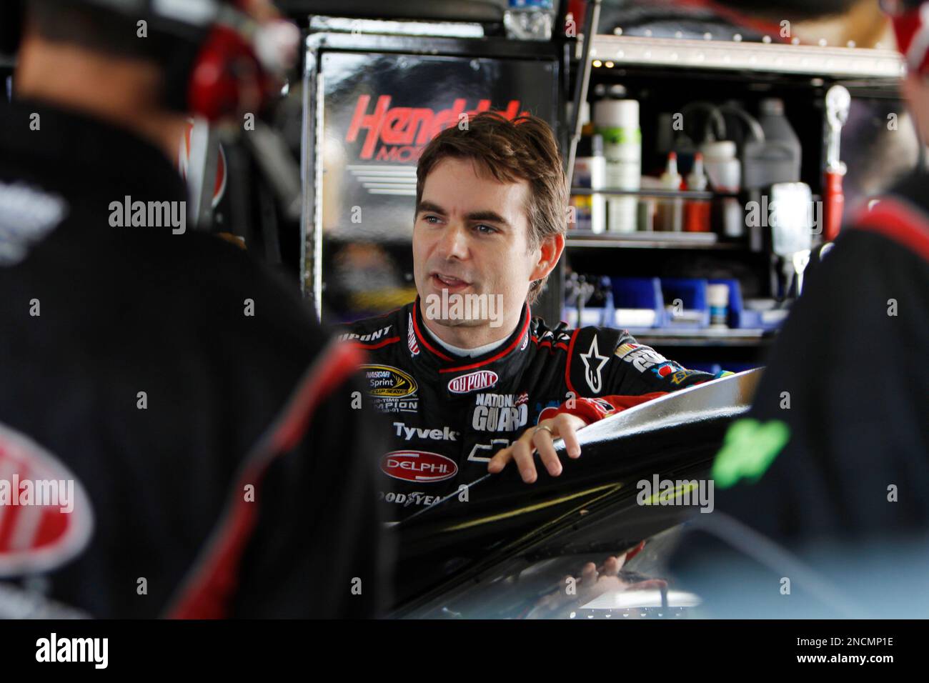 Driver Jeff Gordon talks to his crew during practice for Sunday's ...