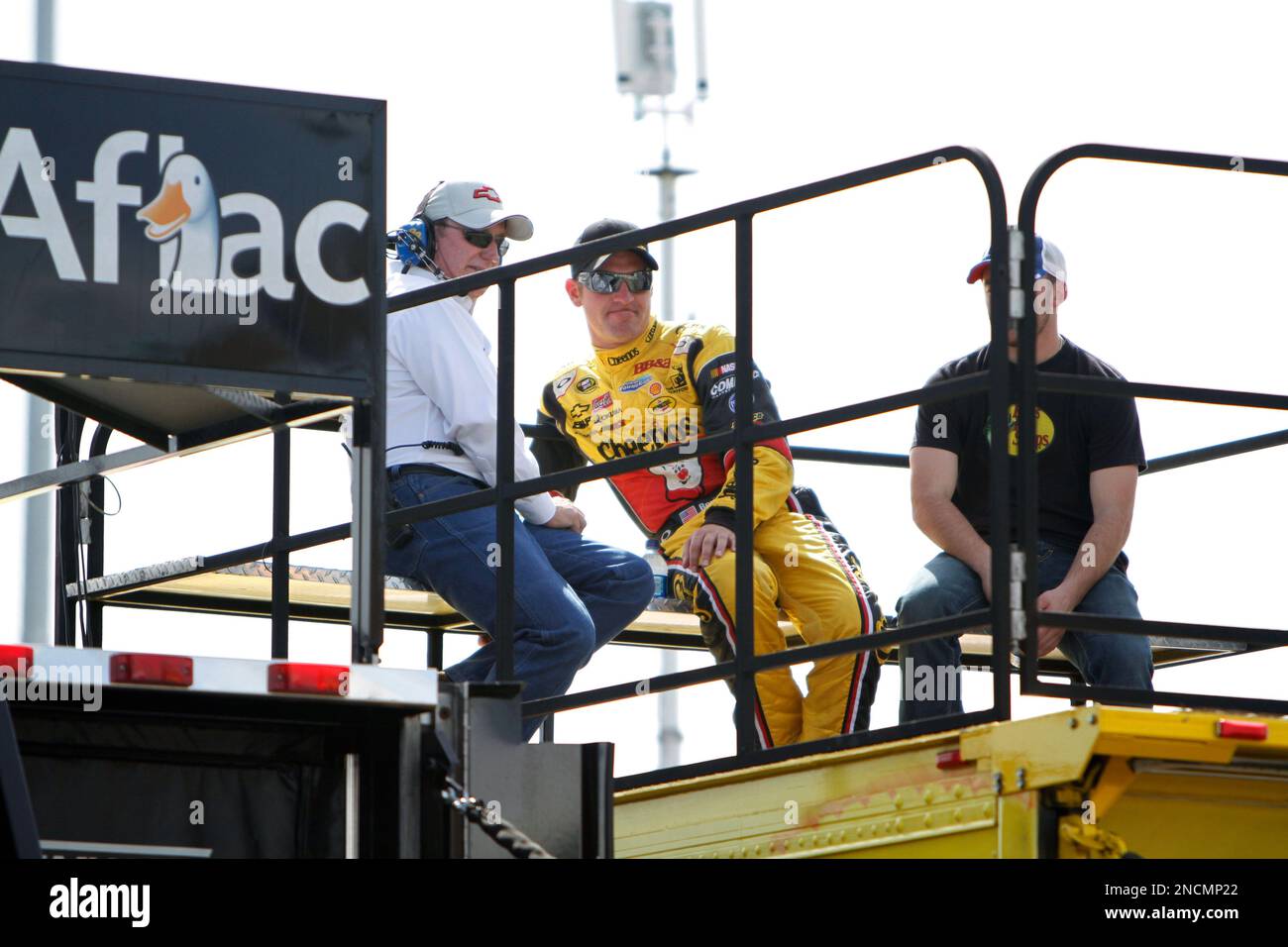 NASCAR driver Clint Bowyer, center, talks to Richard Childress during ...