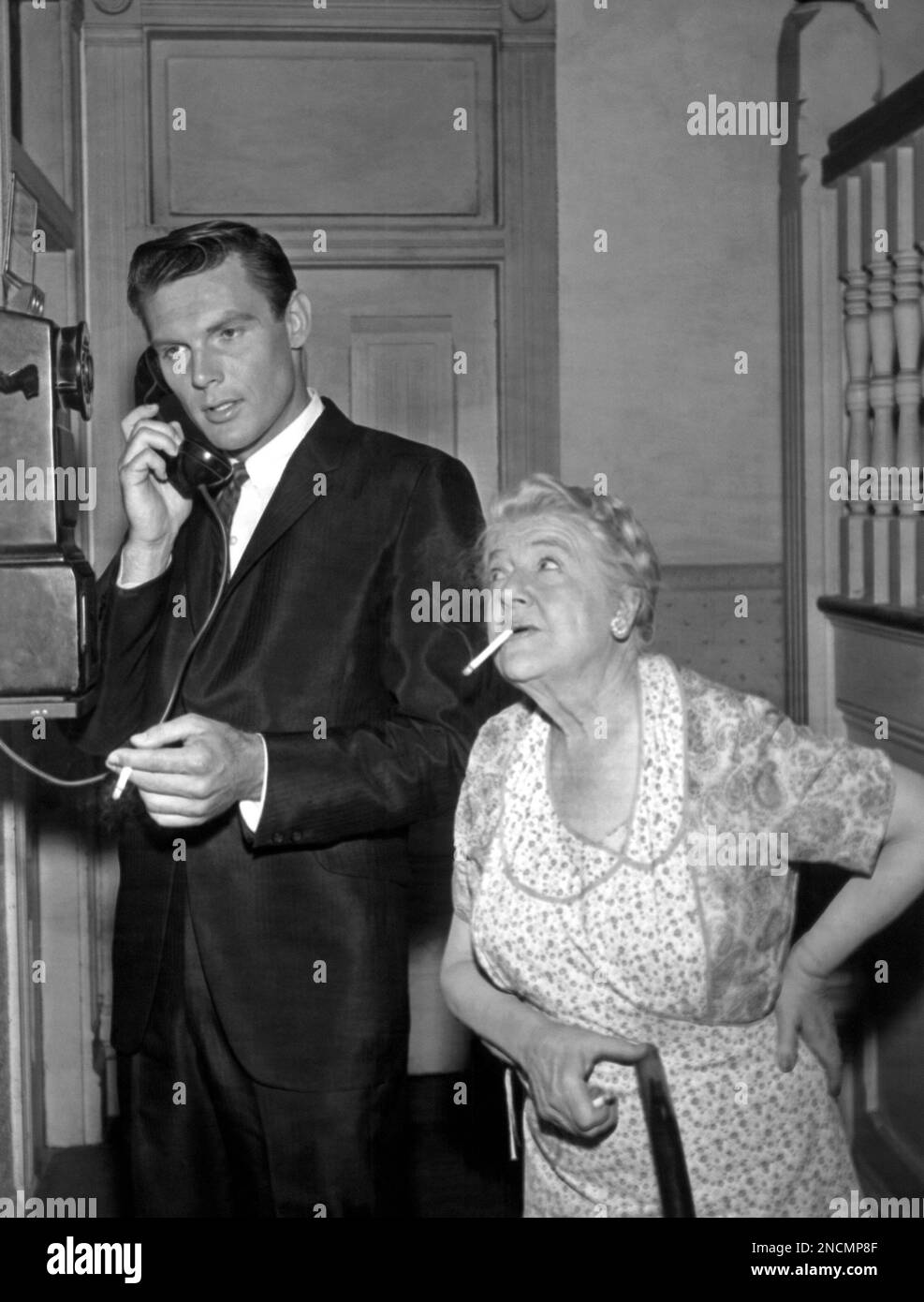 Marjorie Bennett as the landlady, makes sure she doesn’t miss a word as ...