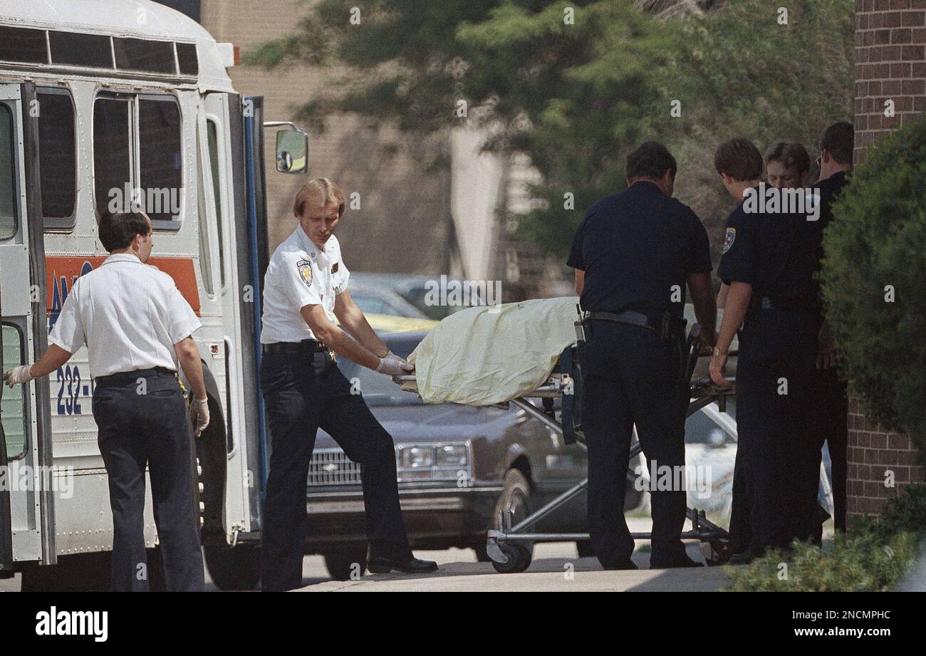 Members of the Edmond, Oklahoma, police department and medical ...