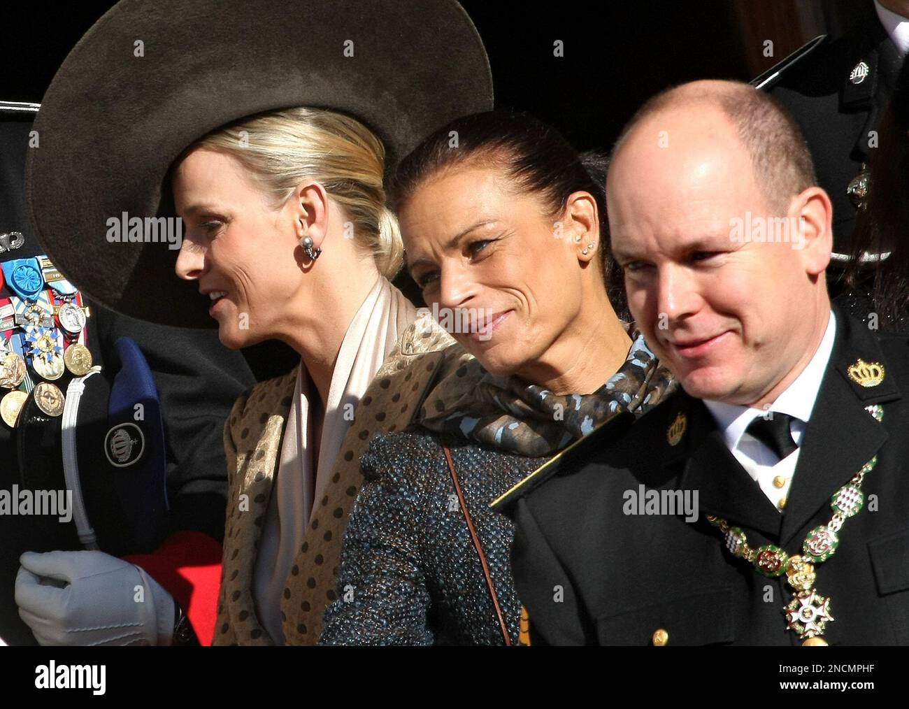 Prince Albert II of Monaco, right, his fiancee Charlene Wittstock,left ...