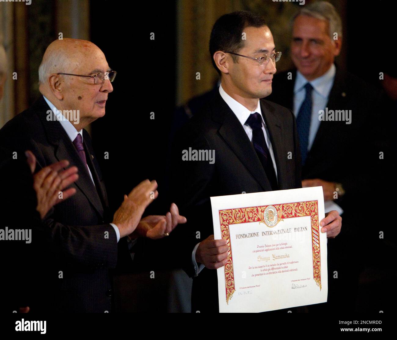 Italian President Giorgio Napolitano, left, awards Japan's Shinya ...
