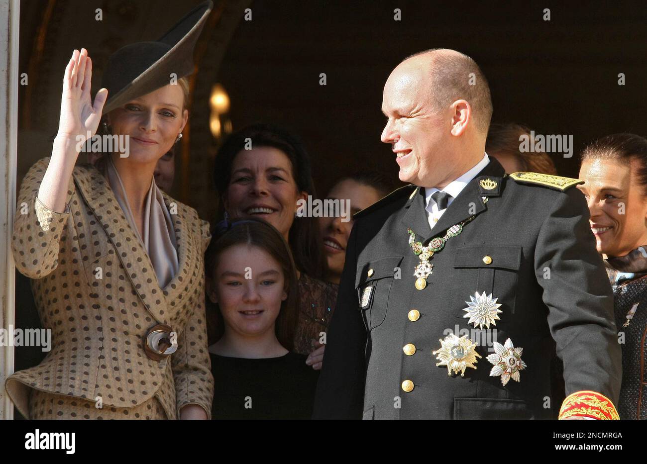 Prince Albert II of Monaco and his fiancee Charlene Wittstock, left ...