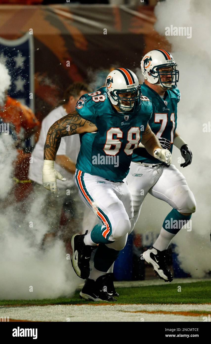 Miami Dolphins guard Richie Incognito (68) and guard Cory Procter (71 ...